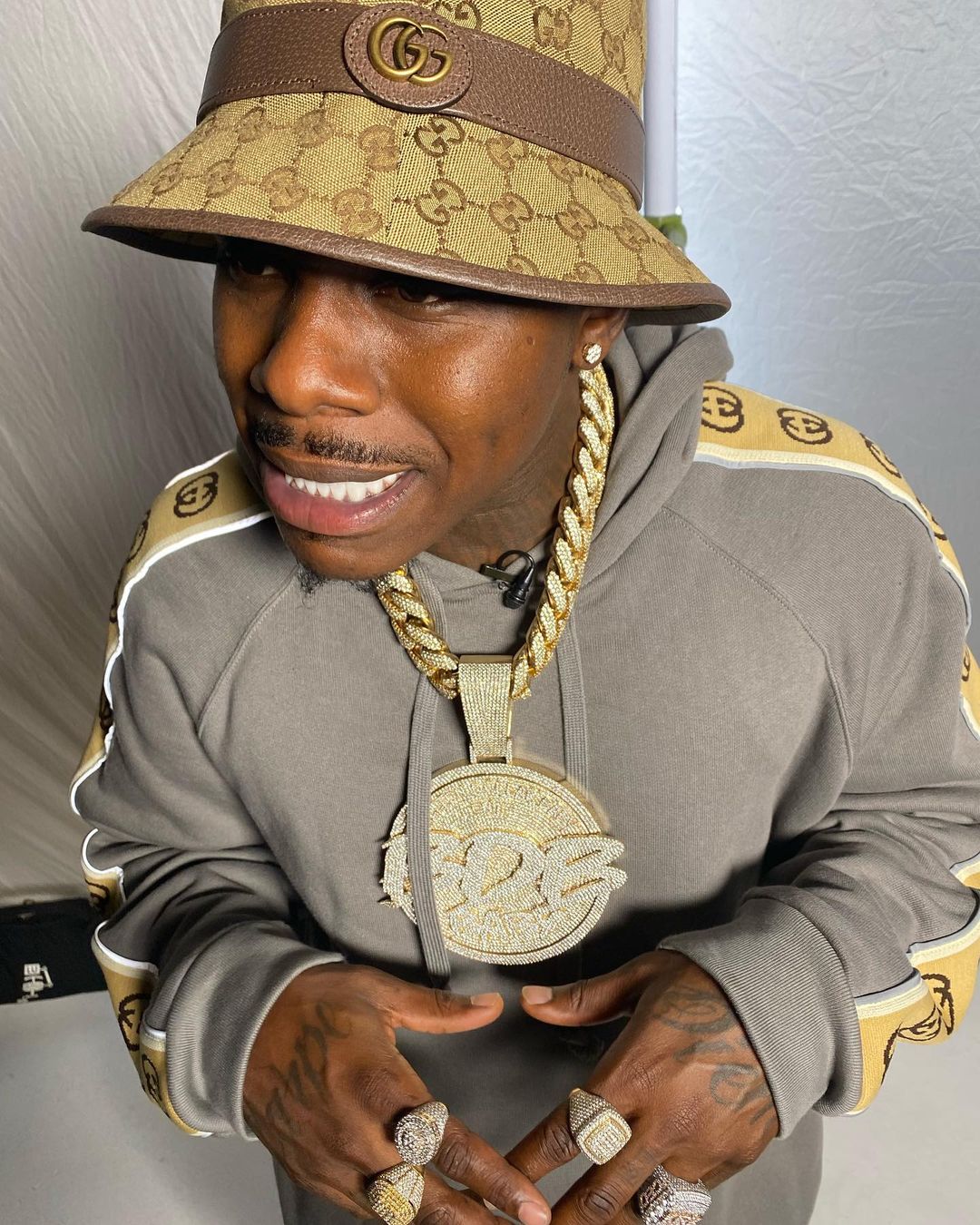 Mais pourquoi les rappeurs sont-ils tous obsédés par Gucci